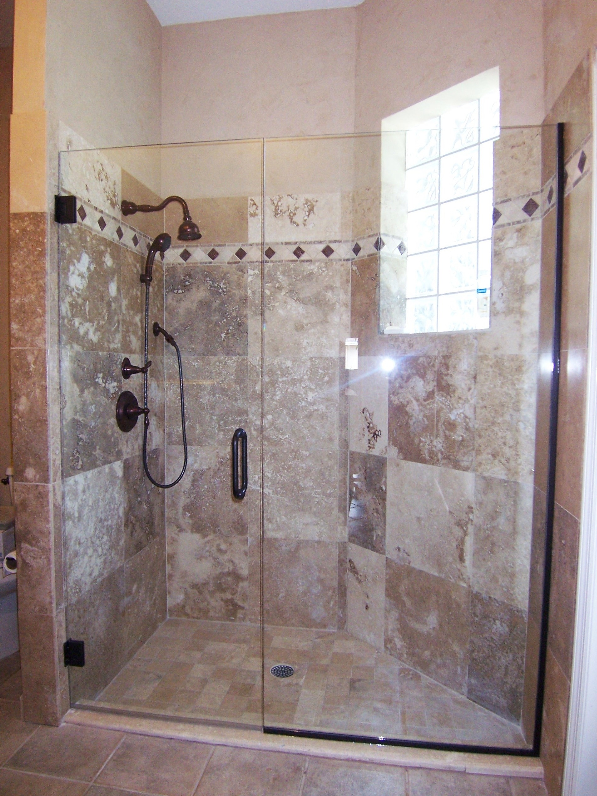 Inline Panels & 3/8" Frameless Glass Shower Doors in Orlando