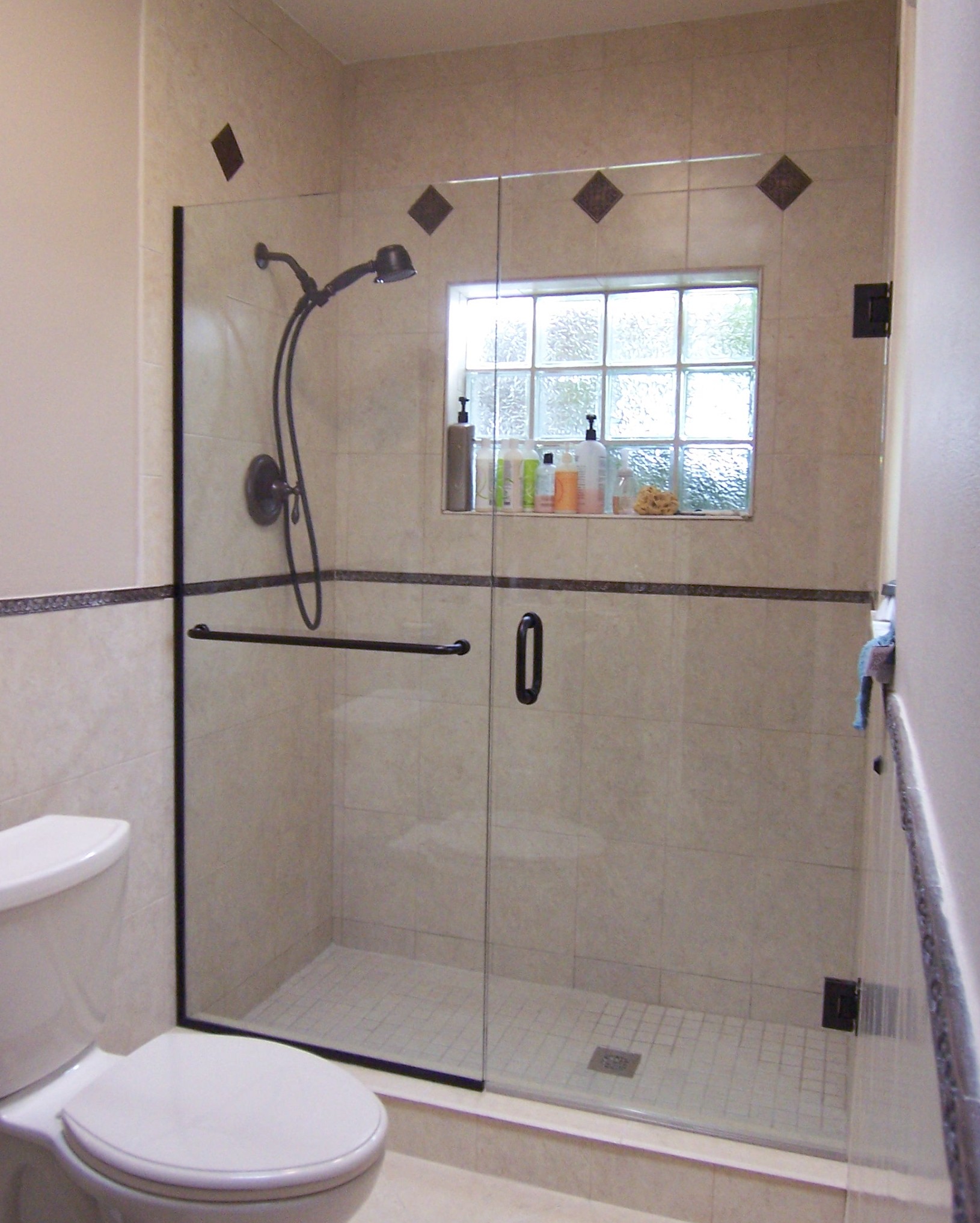 Inline Panels & 3/8" Frameless Glass Shower Doors in Orlando