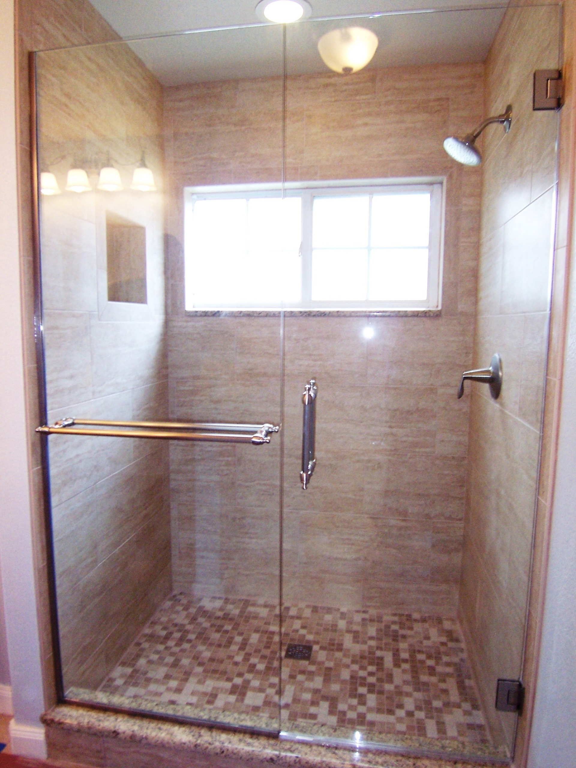 Inline Panels & 3/8" Frameless Glass Shower Doors in Orlando