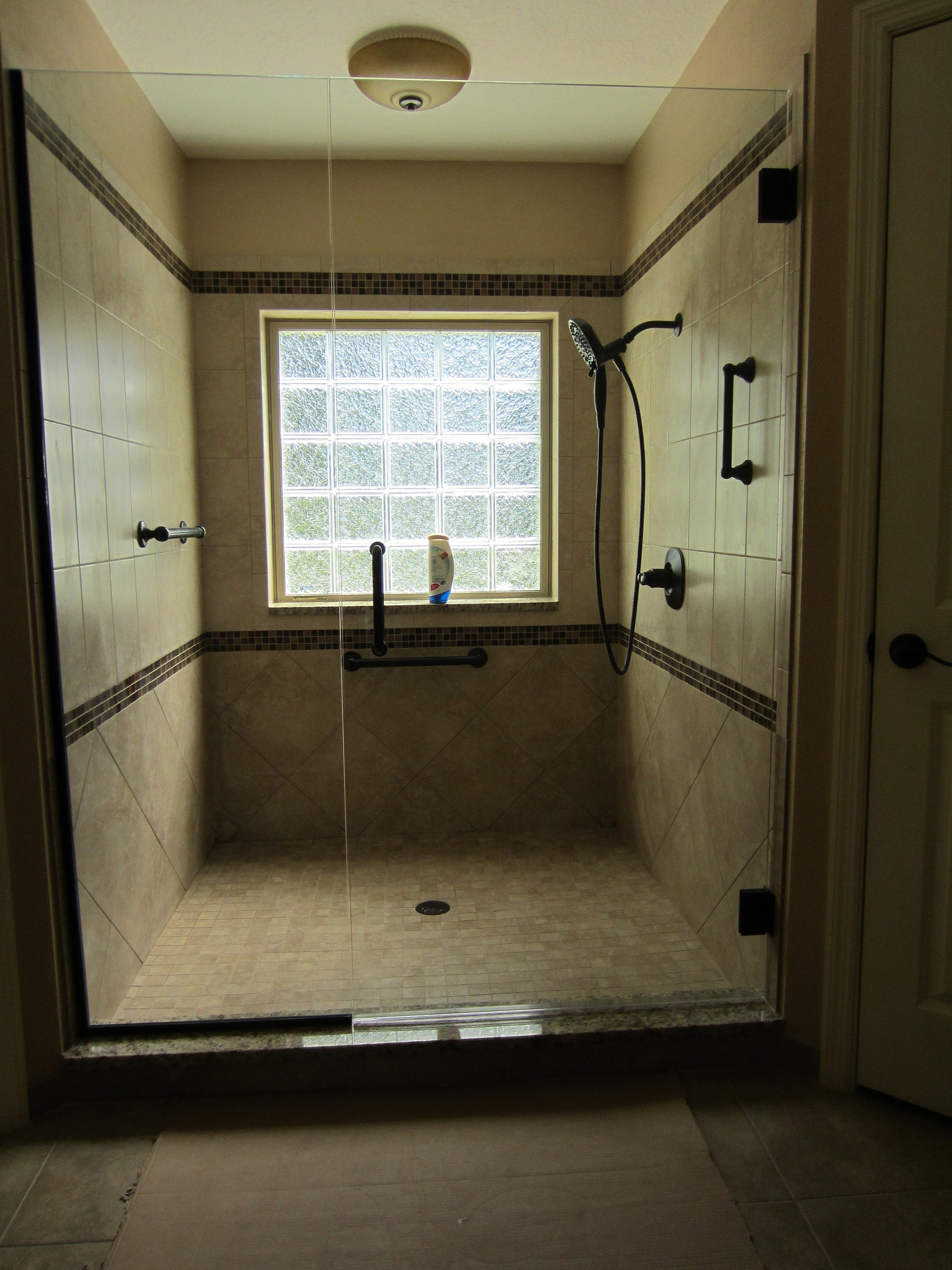 Inline Panels & 3/8" Frameless Glass Shower Doors in Orlando