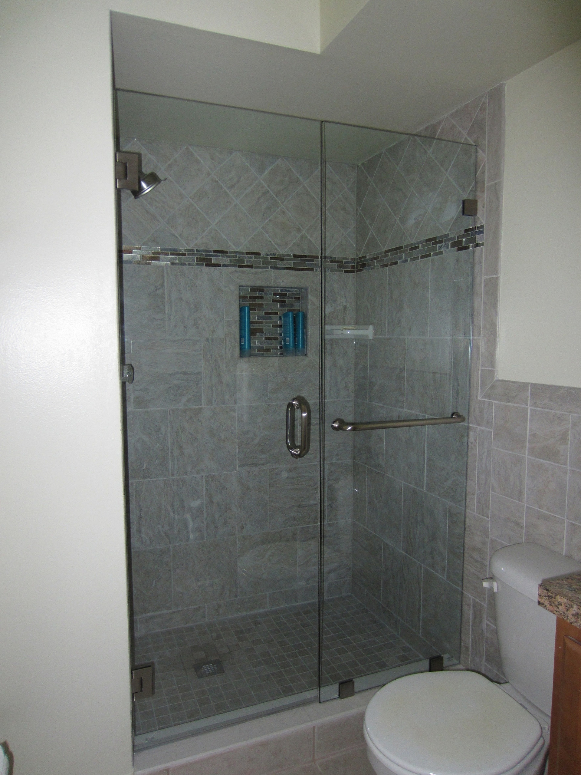Inline Panels & 3/8" Frameless Glass Shower Doors in Orlando