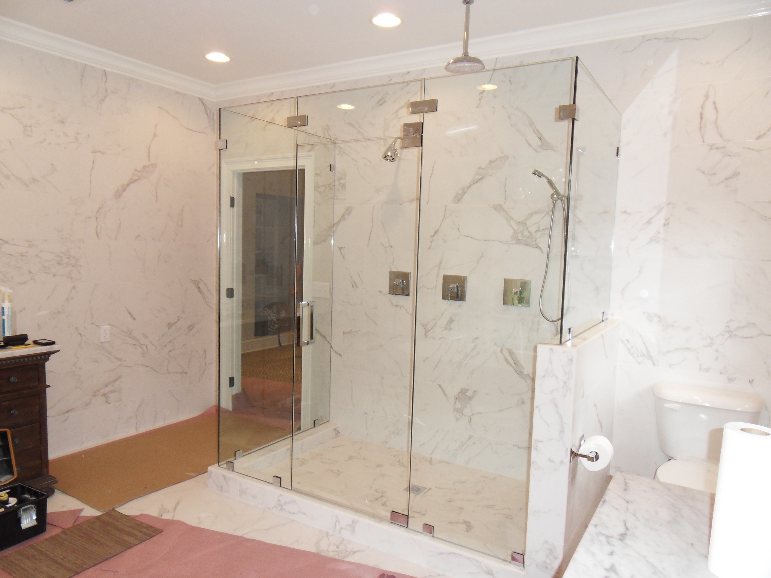 View our 3/8" Transom Glass Shower Doors Gallery | Dixie Shower Doors